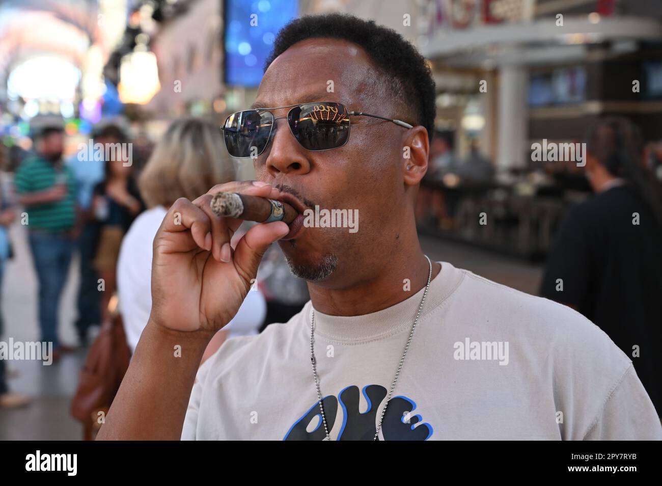 Black man smoking a cigar Stock Photo - Alamy