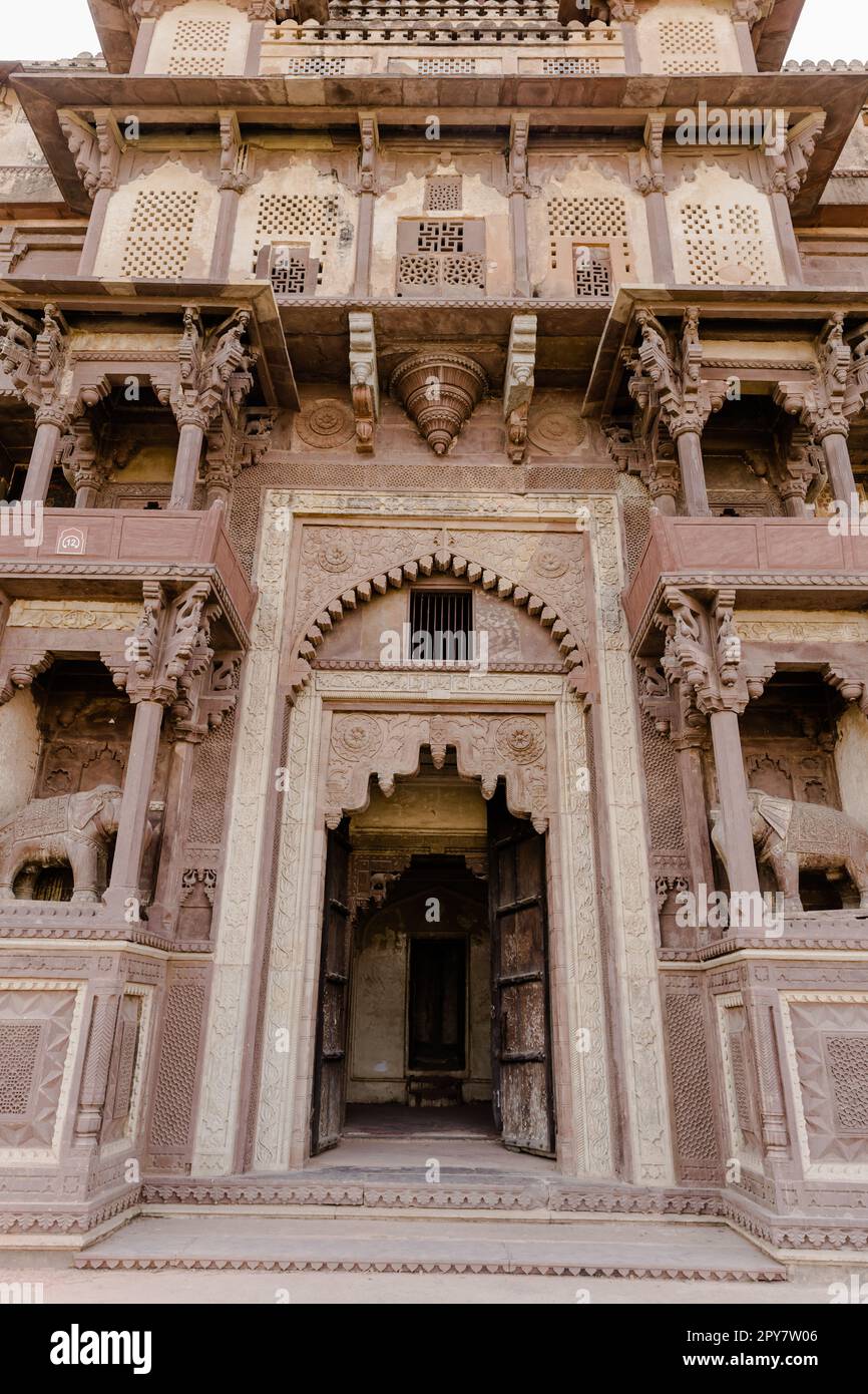 The entrance of the historic Orchha Fort in India, with its intricate ...