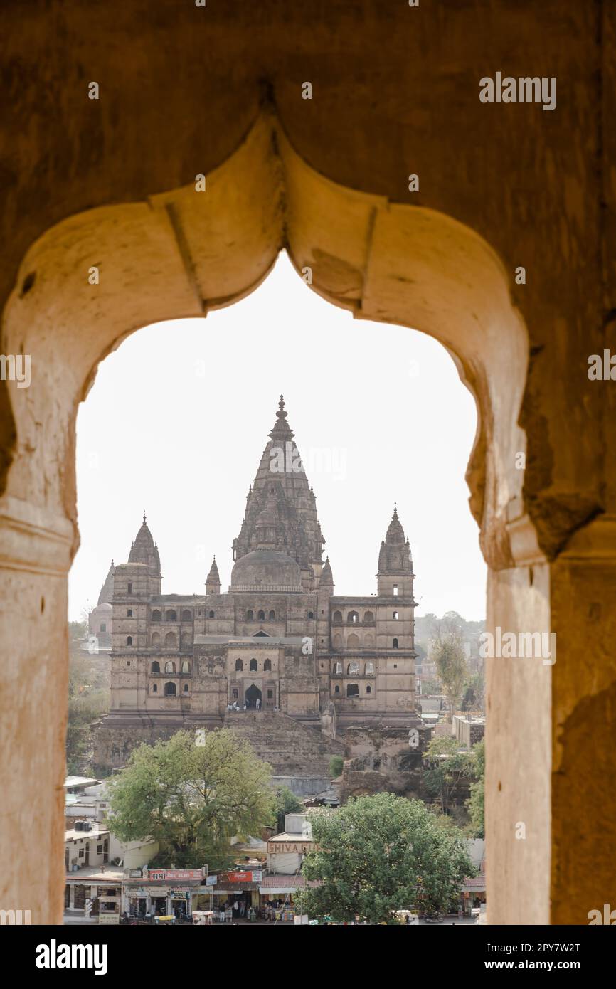 The arched window of the historic Orchha Fort in India, with its ...