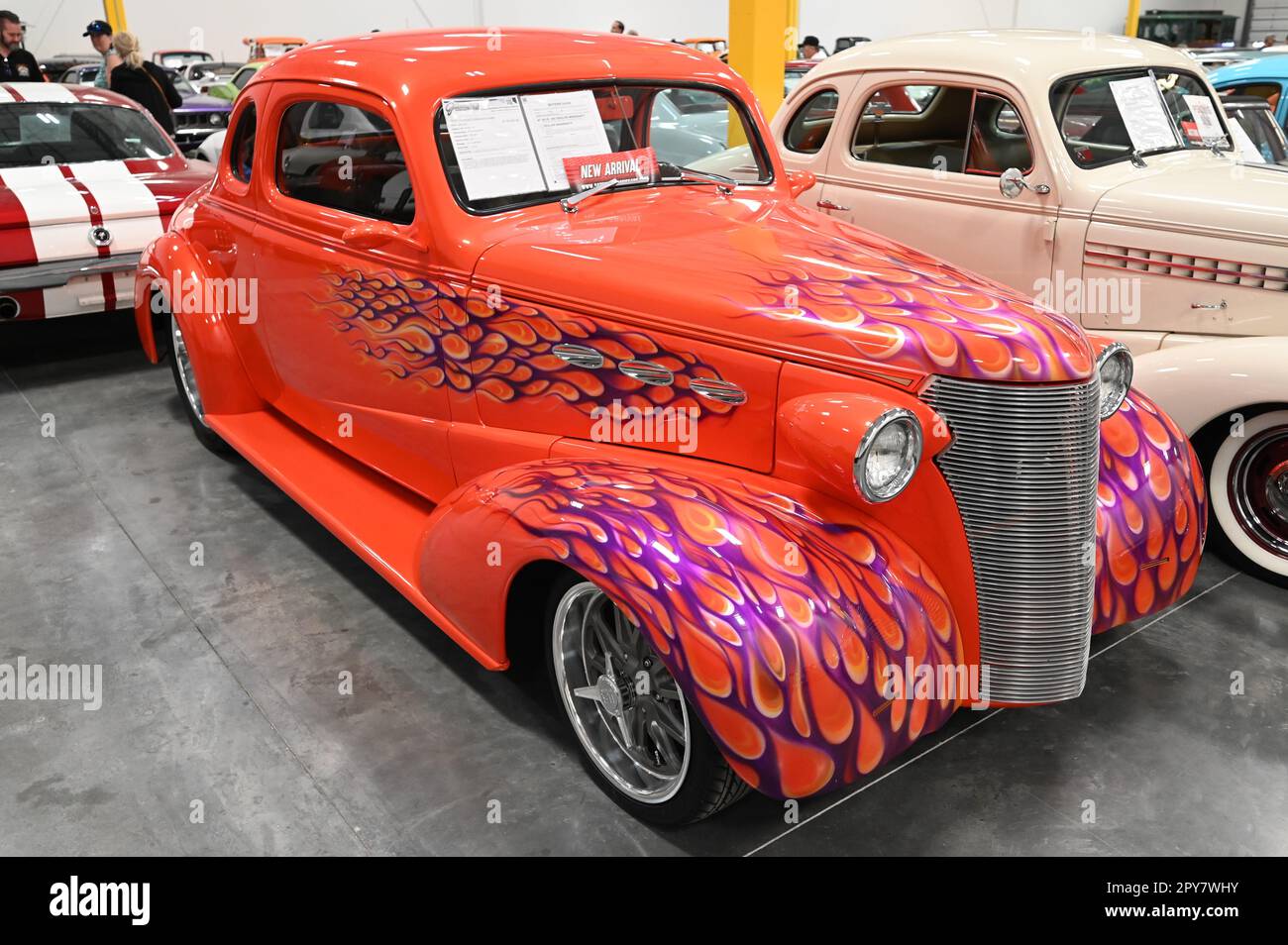An orange American custom car Stock Photo - Alamy