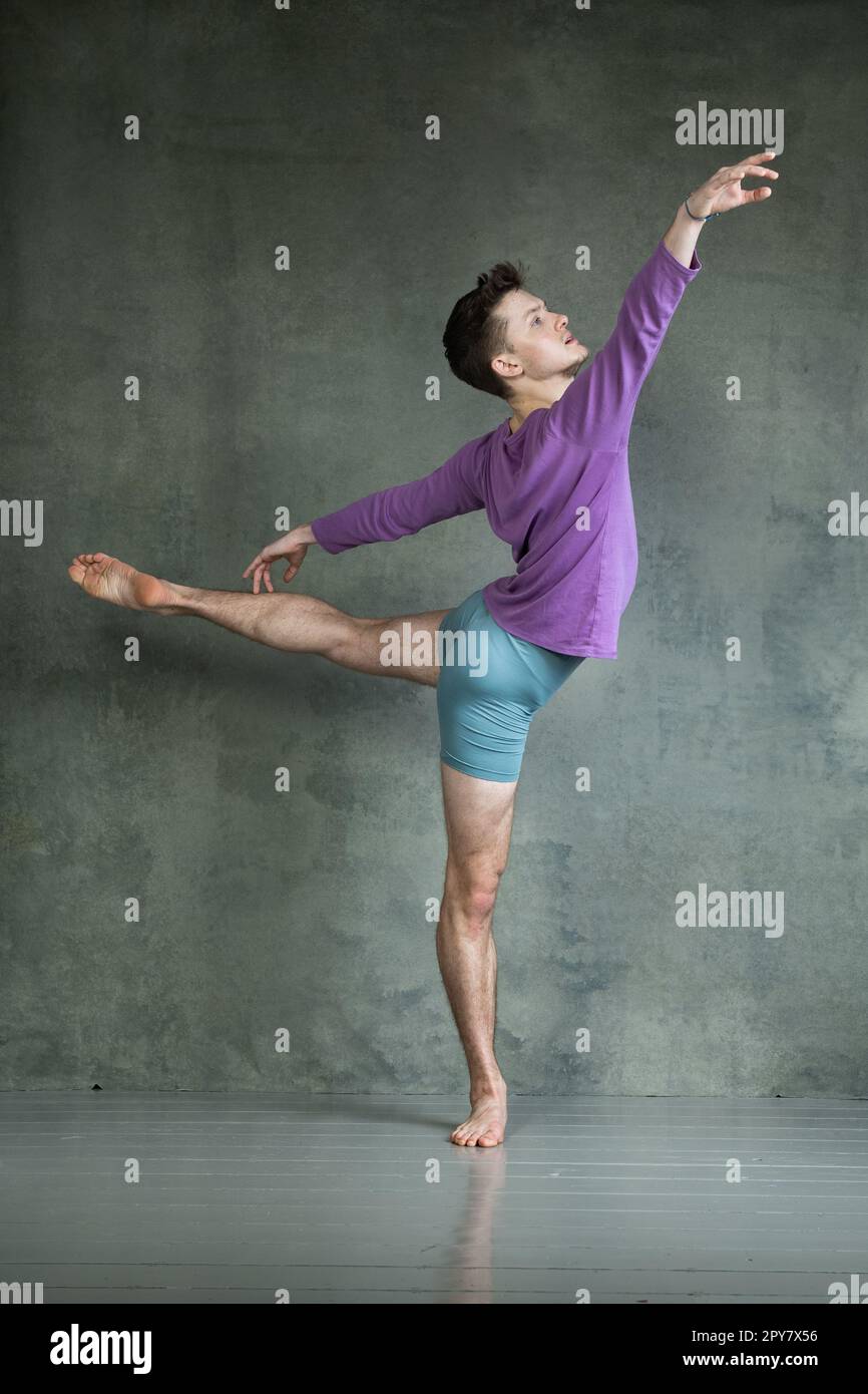 Male dancer in dyanmic dance pose in photo studio Stock Photo - Alamy