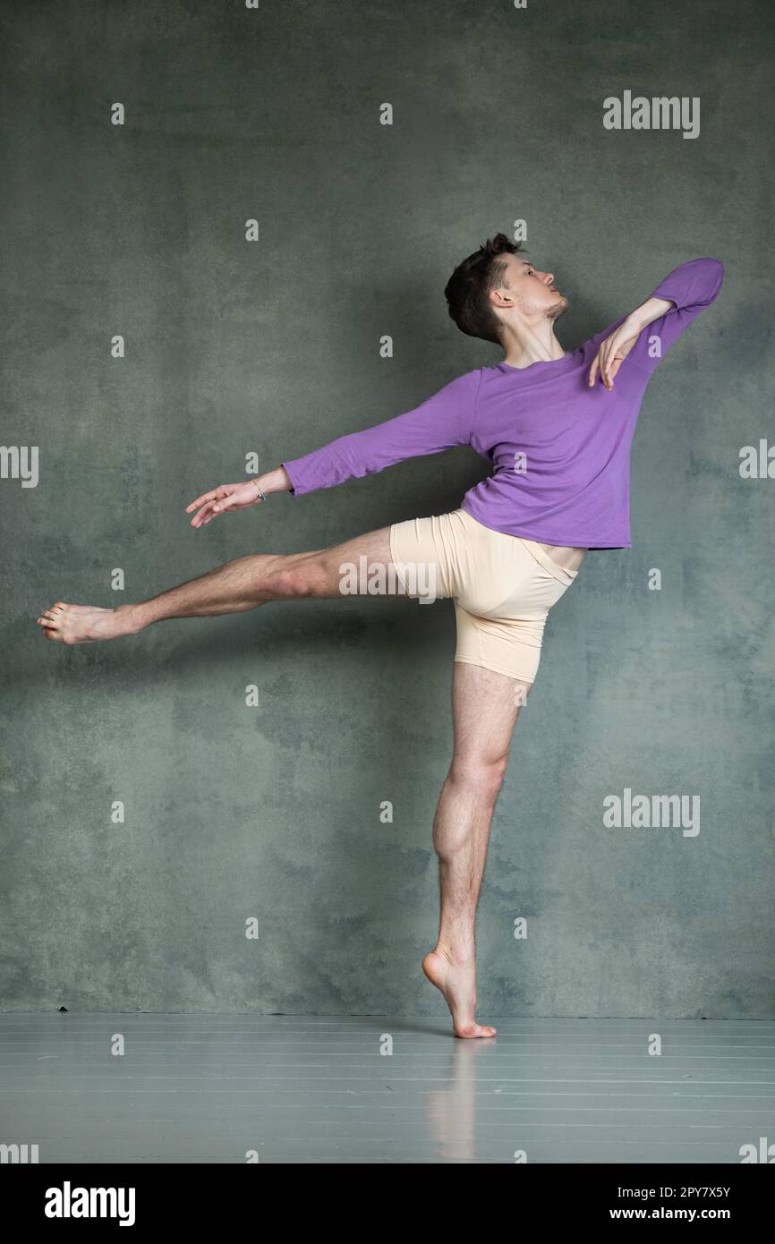 Male dancer in dyanmic dance pose in photo studio Stock Photo - Alamy