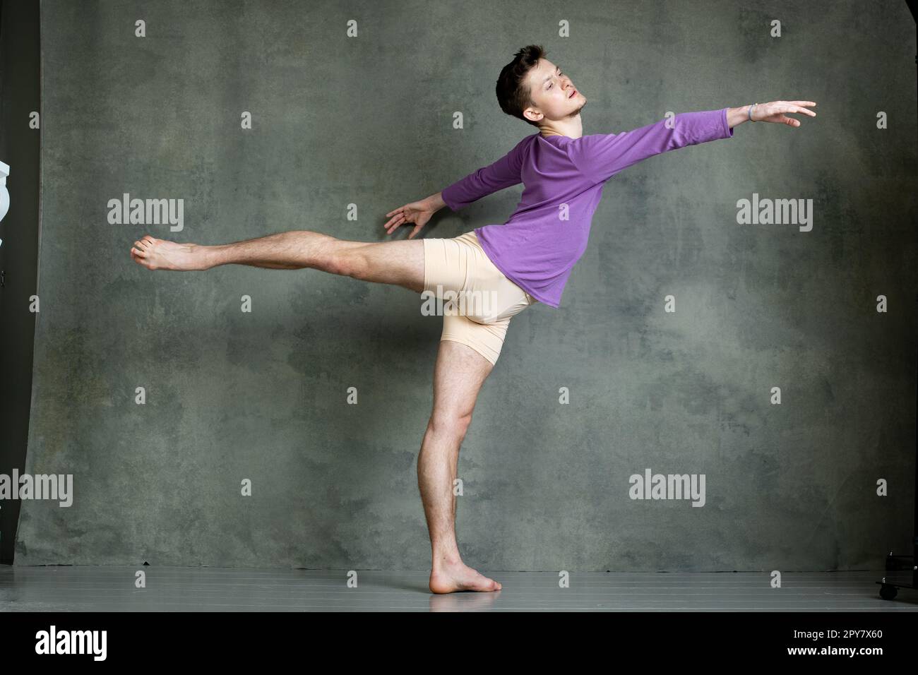 Male dancer in dyanmic dance pose in photo studio Stock Photo - Alamy