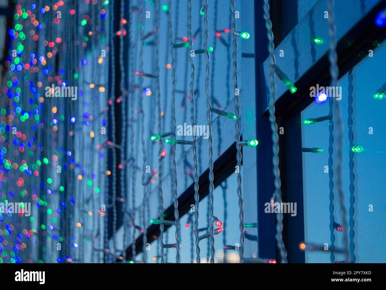 Festive decoration of office buildings, lights electric garland with ...