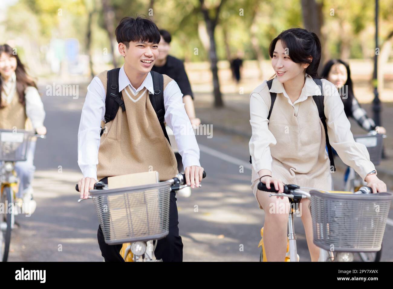 Asian teen girl riding bike hi-res stock photography and images - Alamy