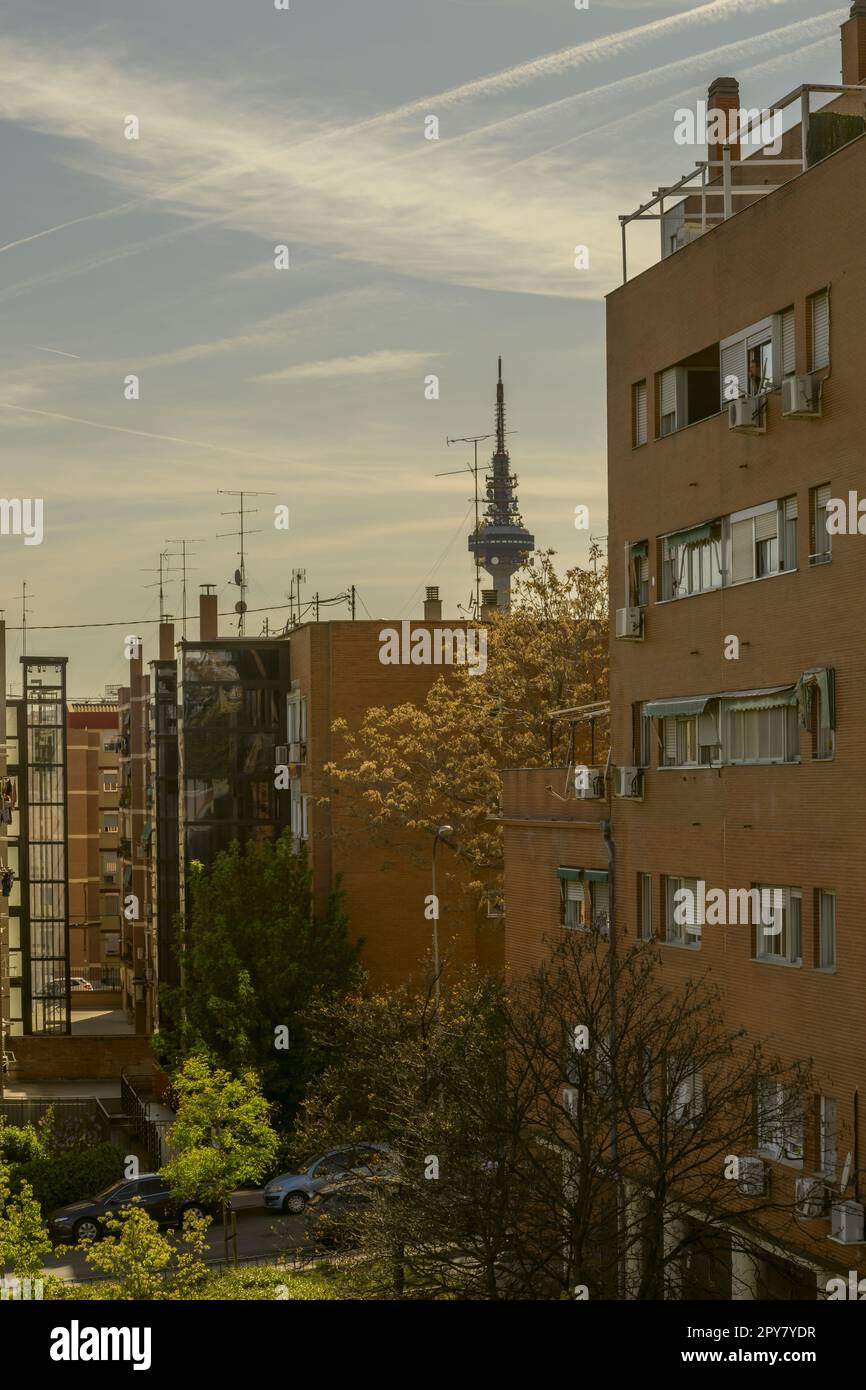 Facades of urban residential buildings and in the background the Madrid ...