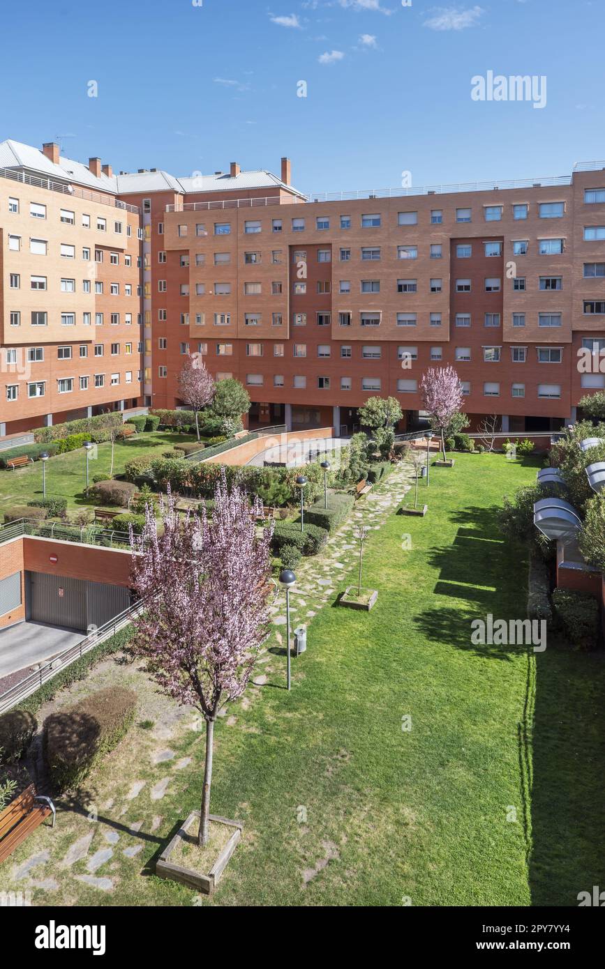 Interior common areas of a residential housing estate with gardens ...