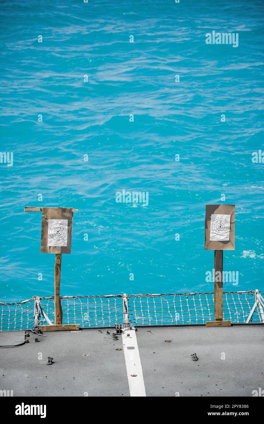 Paper shooting targets on a pole Stock Photo - Alamy
