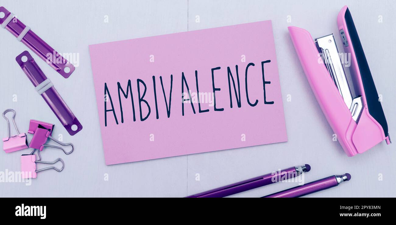 Hand writing sign Ambivalence. Word for attitudes or feelings ...