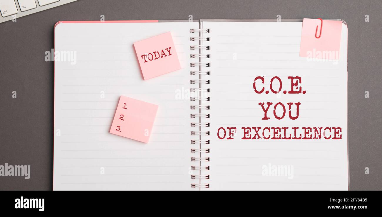 Hand writing sign C.O.E. Center Of Excellence. Business showcase being ...