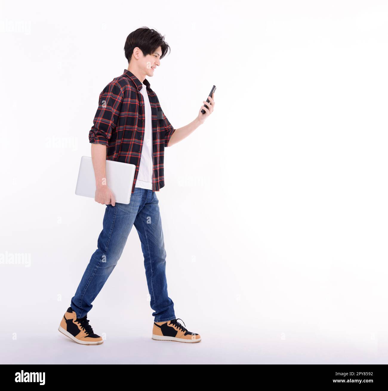 Walking young guy using hi-res stock photography and images - Alamy