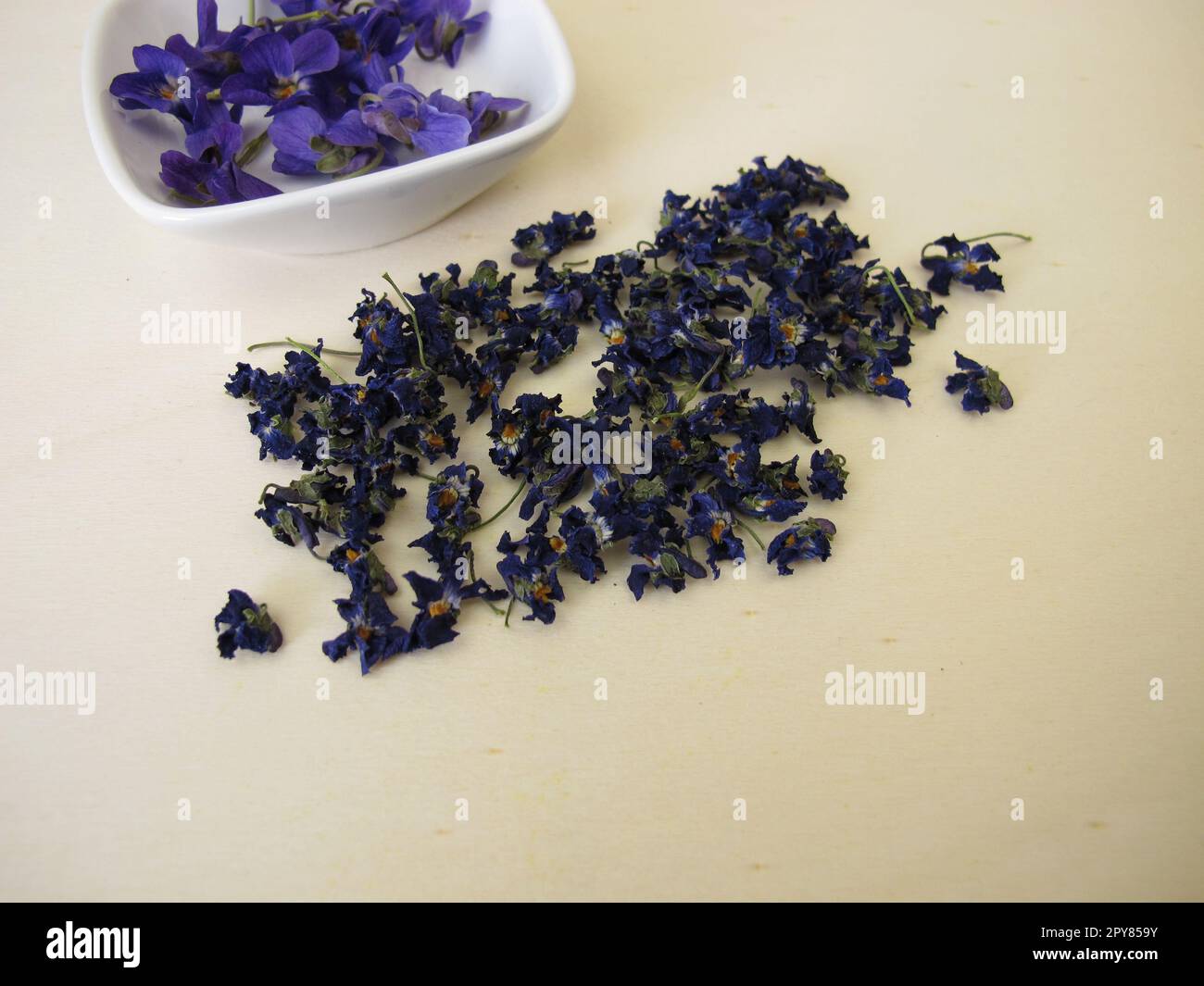 Dried flowers of sweet violets for tea Stock Photo - Alamy