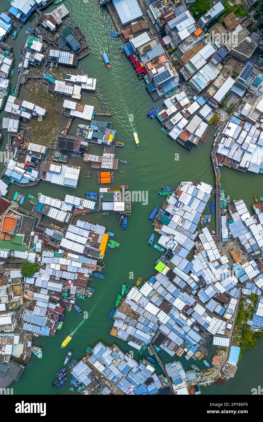 An aerial view of a bustling urban area on a river Stock Photo - Alamy