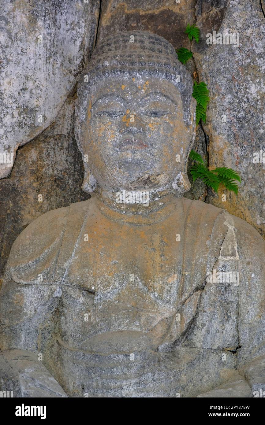 Usuki, Japan - May 1, 2023: Detail of one of the Usuki Stone Buddhas ...