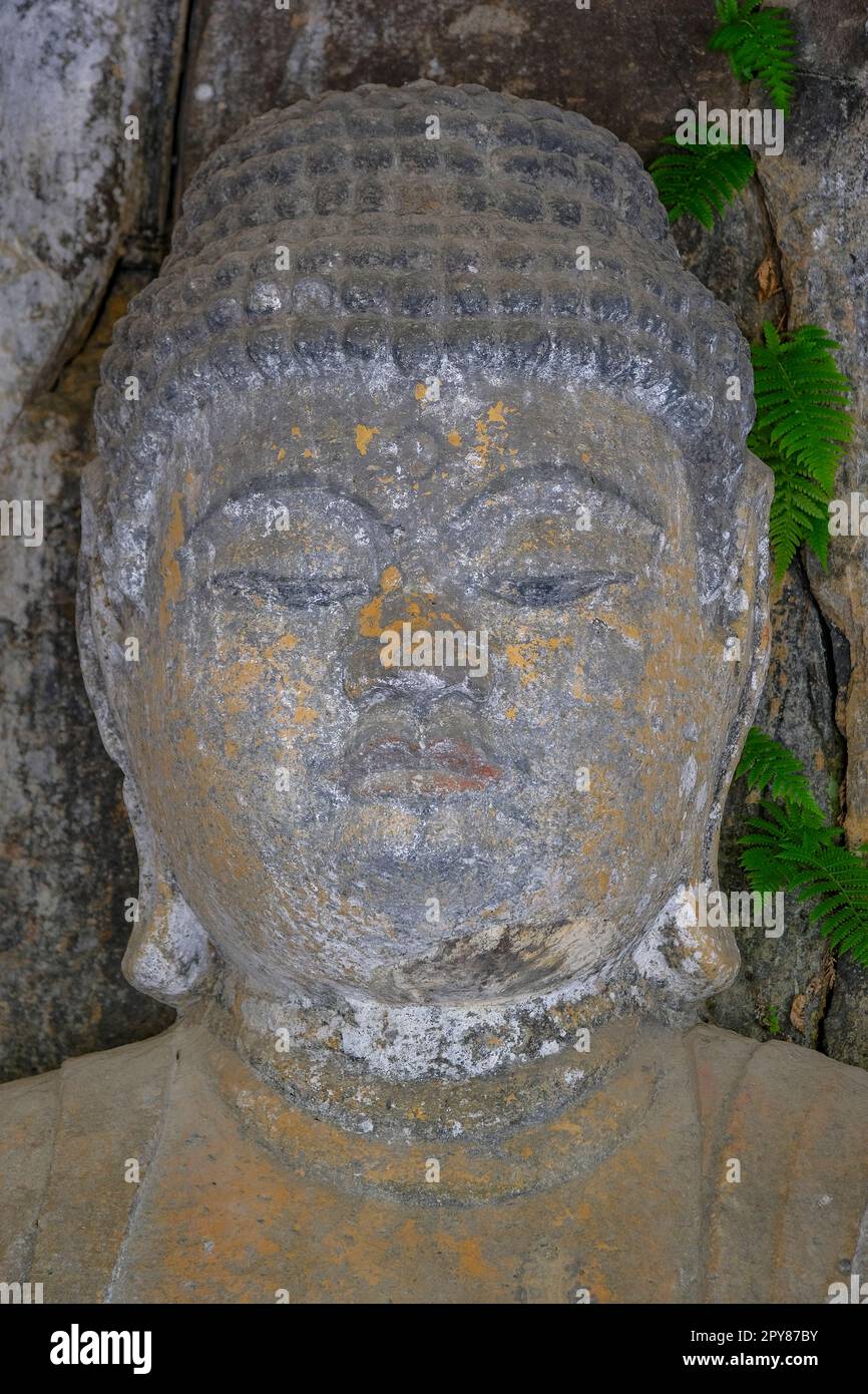 Usuki, Japan - May 1, 2023: Detail of one of the Usuki Stone Buddhas ...