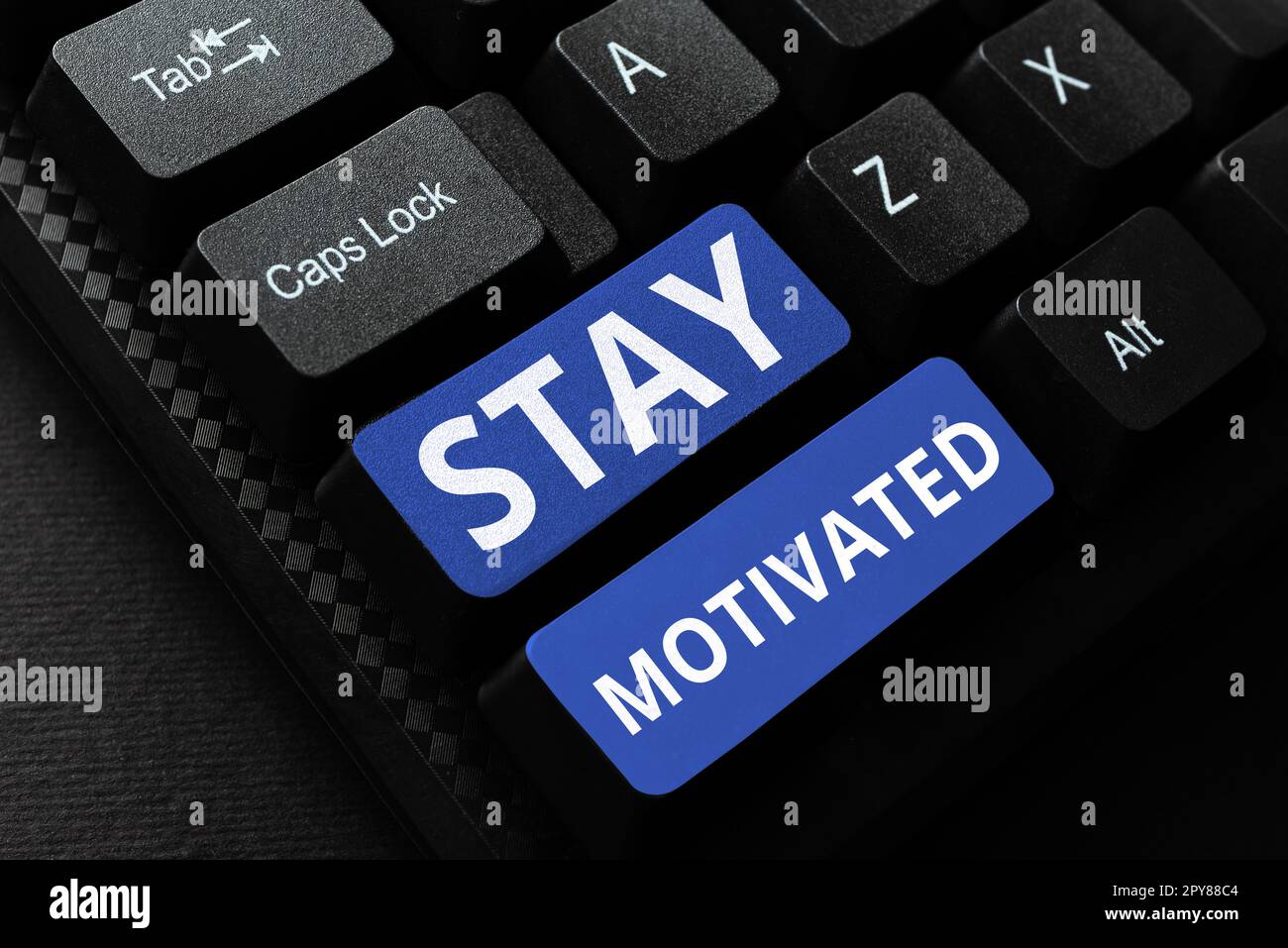 Text showing inspiration Stay Motivated. Word for Reward yourself every ...