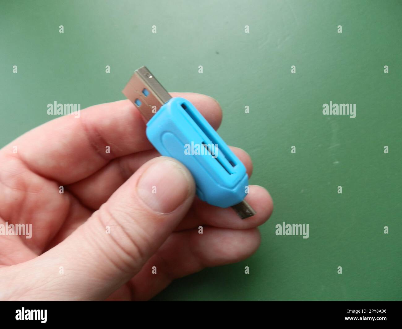 Accessory for smartphone and computer in hand Stock Photo - Alamy