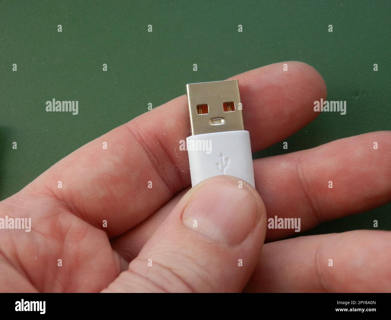 Accessory for smartphone and computer in hand Stock Photo - Alamy