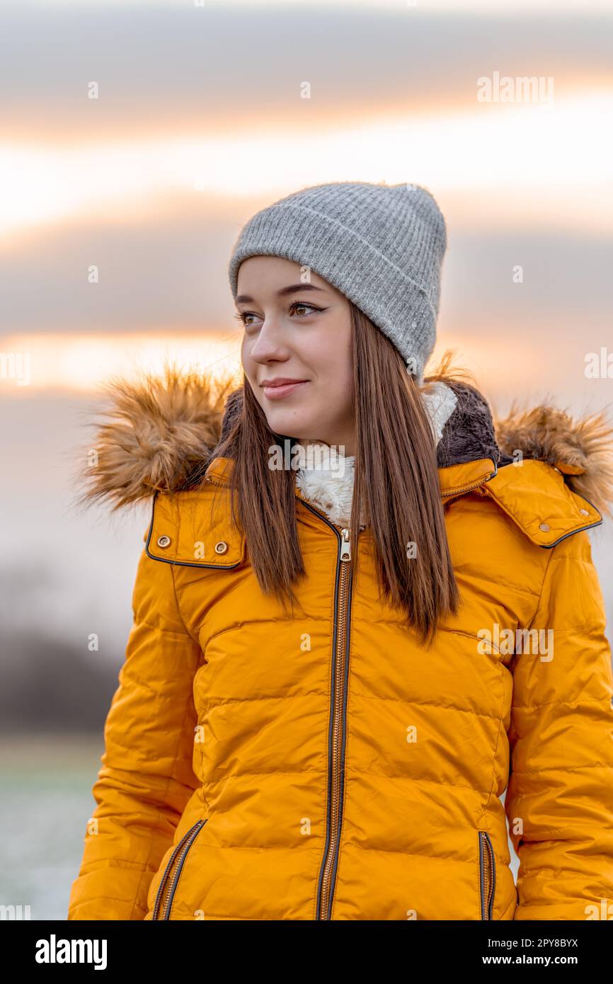 portrait of a beautiful teenage girl at sunset in nature Stock Photo ...