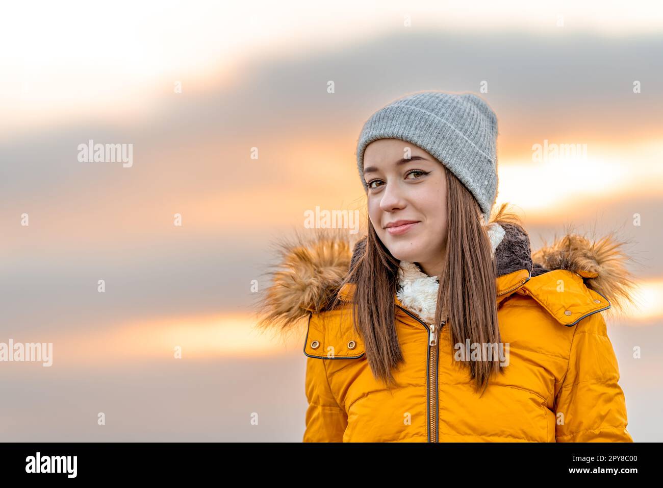 portrait of a beautiful teenage girl at sunset in nature Stock Photo ...