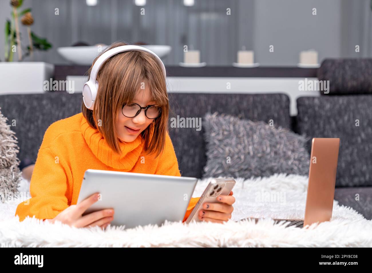 children and modern technology. play and study at home using a laptop ...