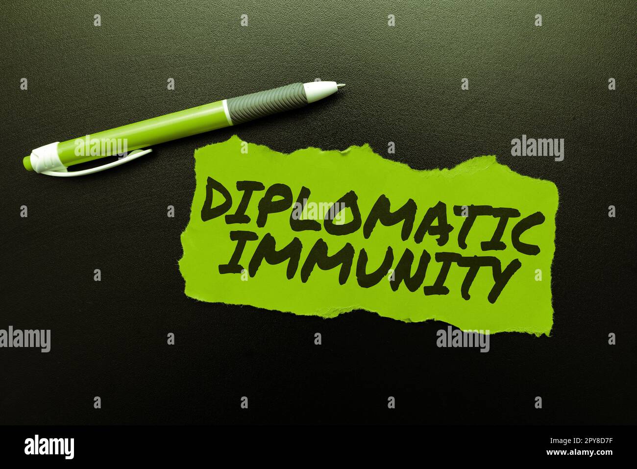 Writing displaying text Diplomatic Immunity. Word Written on law that ...