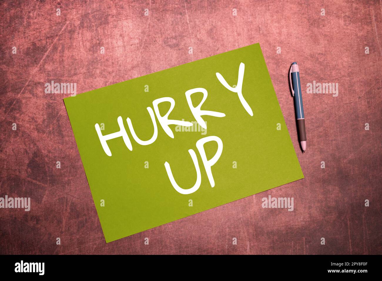 Hand writing sign Hurry Up. Word Written on asking someone to do a job ...