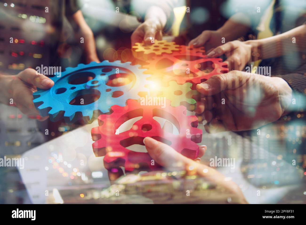 Business team connect pieces of gears. Teamwork, partnership and ...