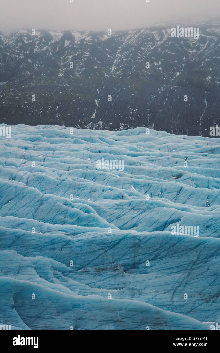 Ice field in ridge bottom landscape photo Stock Photo - Alamy