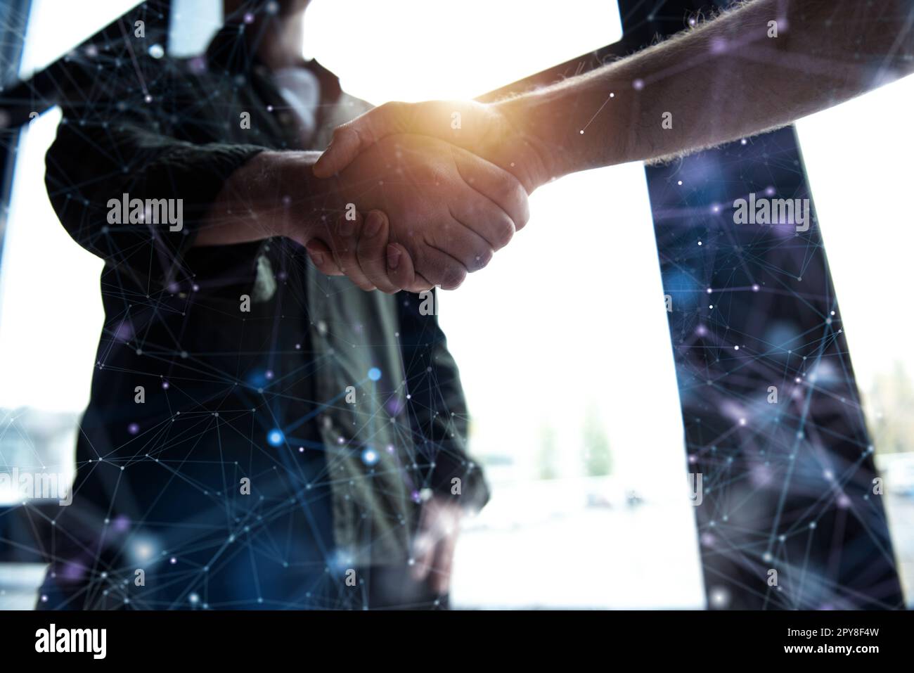 Handshaking business person in office. concept of teamwork and ...