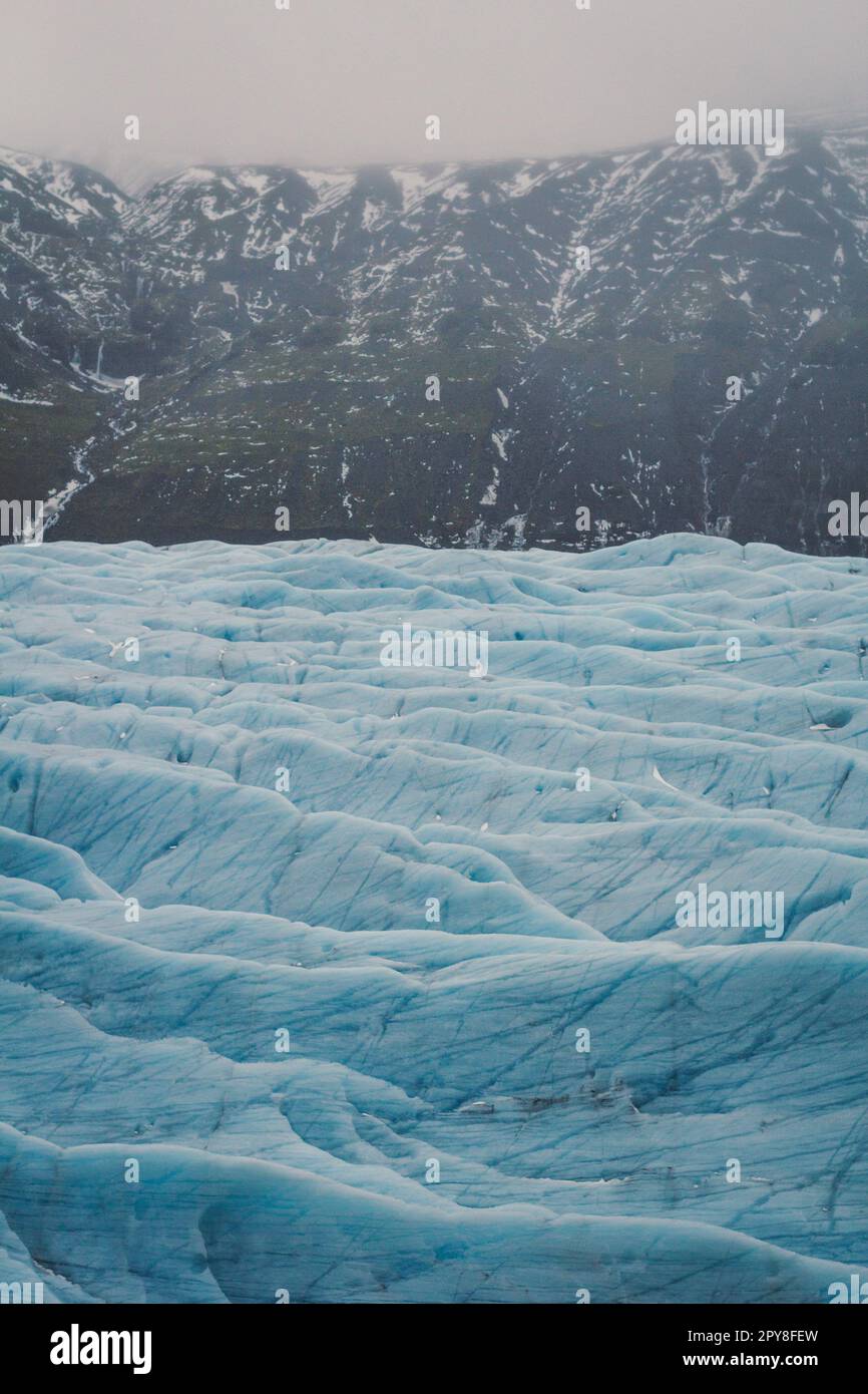 Blue glaciers in mountain bottom landscape photo Stock Photo - Alamy