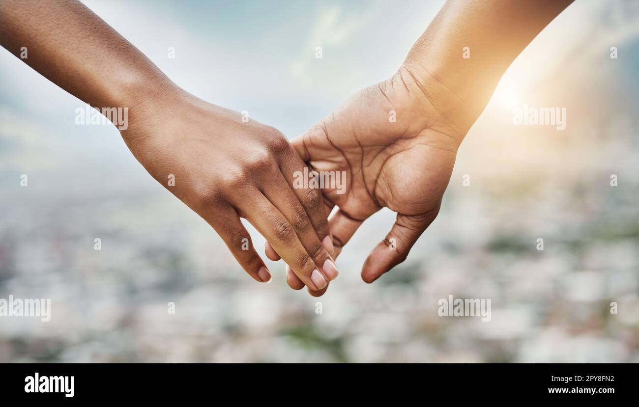 Theres no letting go. Closeup shot of an unrecognizable couple holding ...