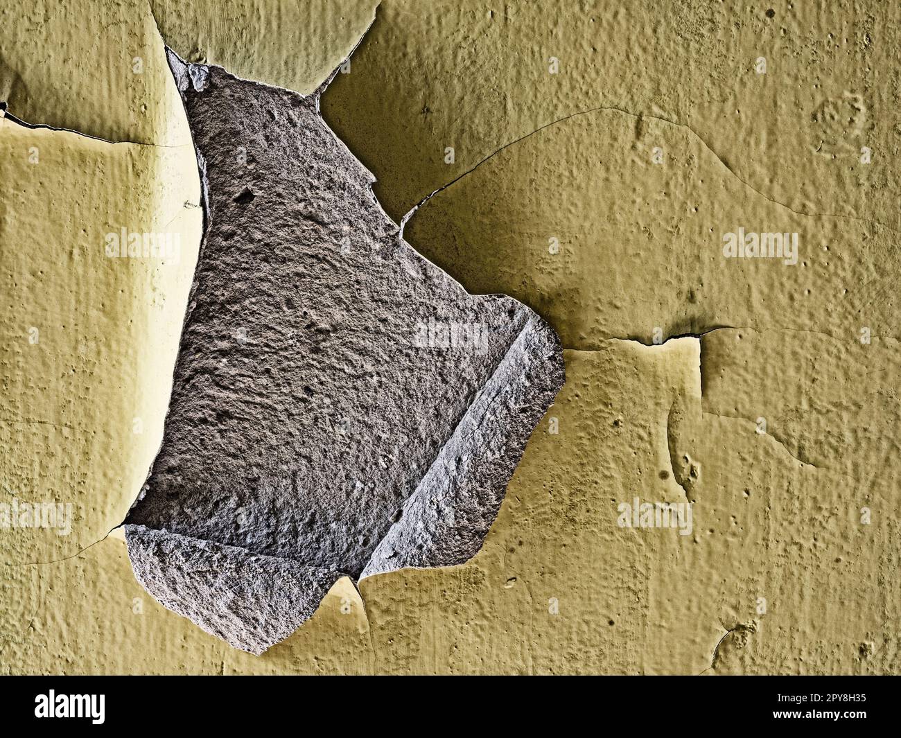 Close-up of piece of peeled paint from yellow painted wall Stock Photo ...