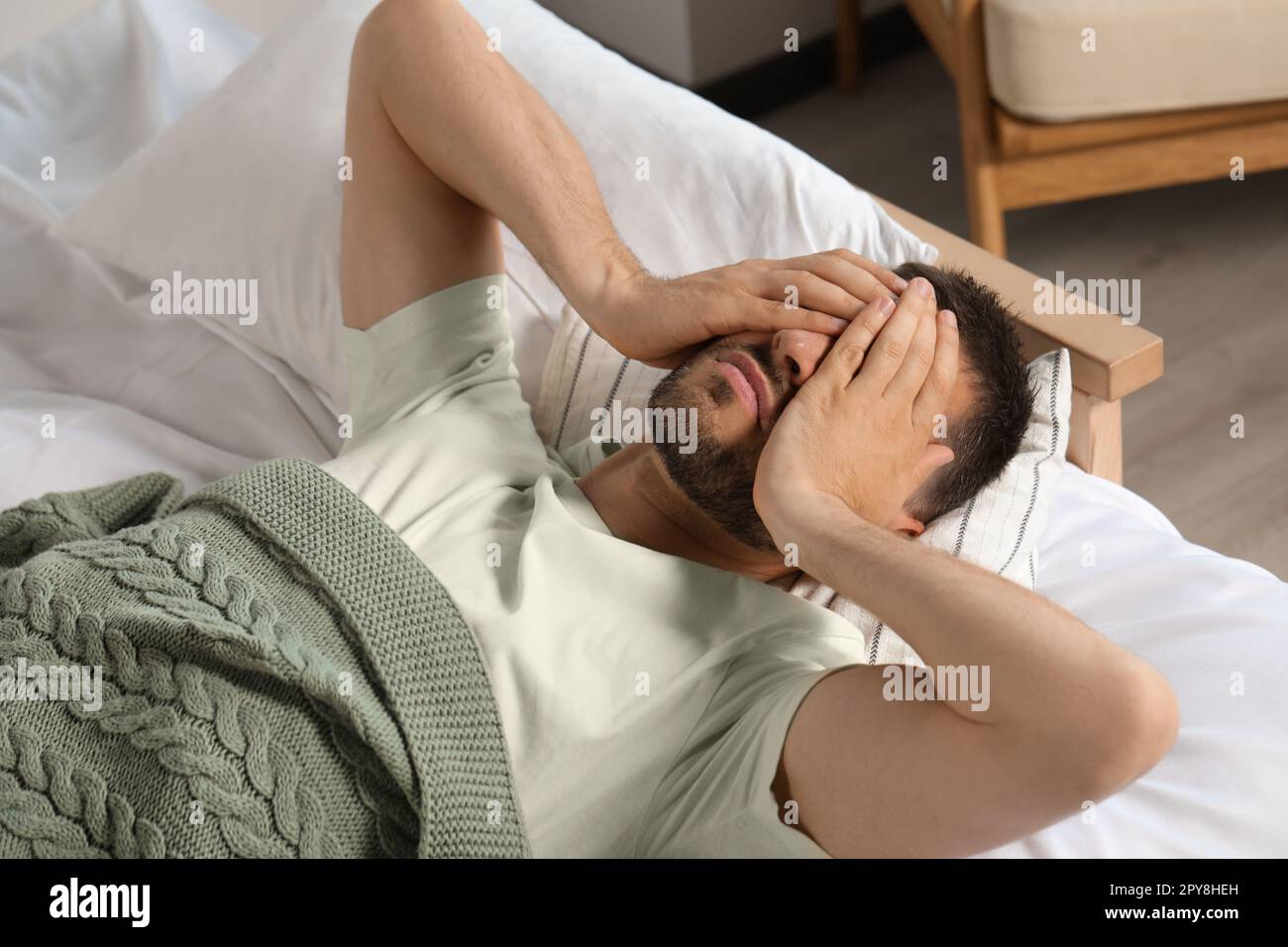 Restless man lying in bed hi-res stock photography and images - Alamy