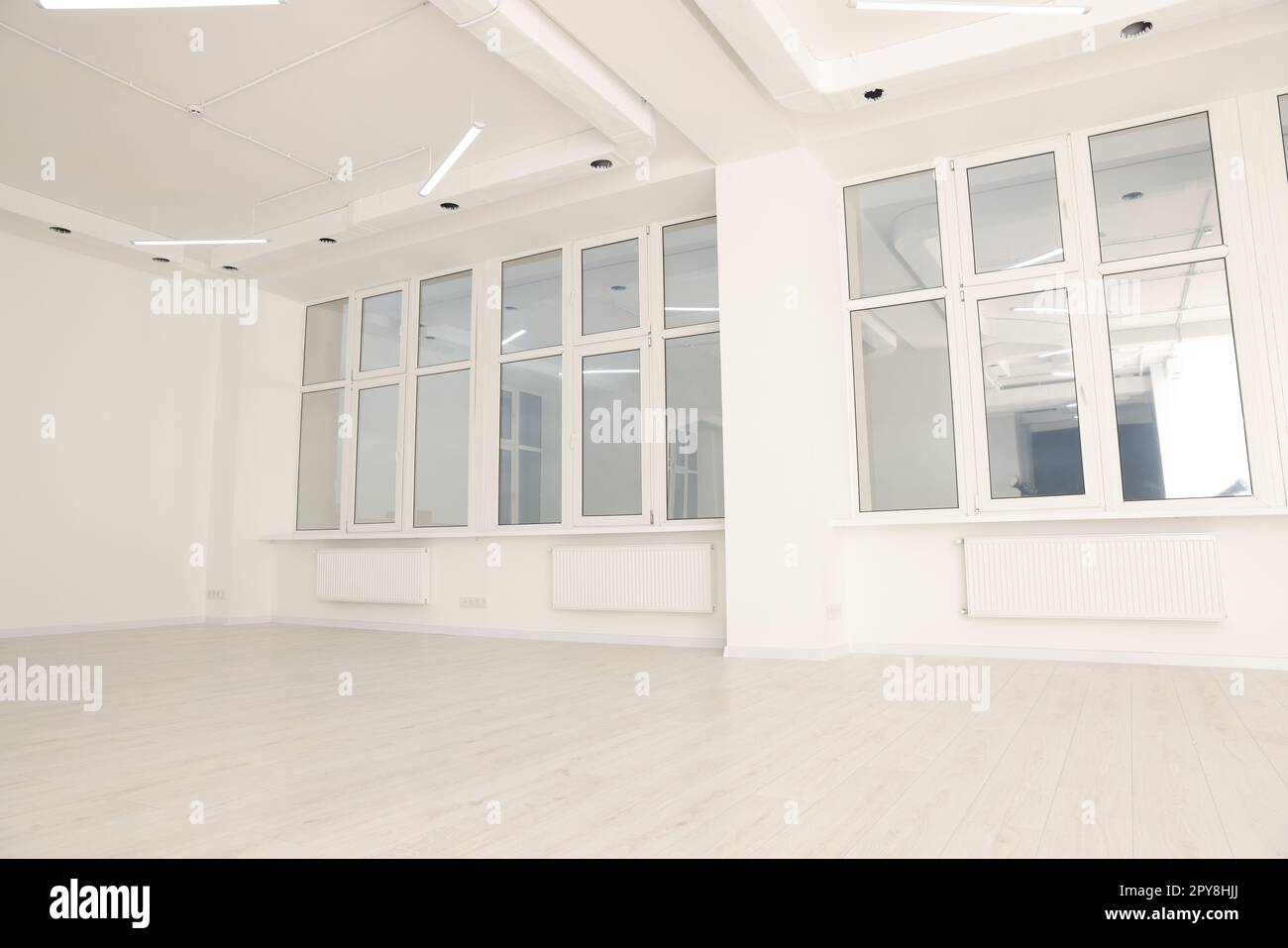 Modern office room with white walls and windows. Interior design Stock ...