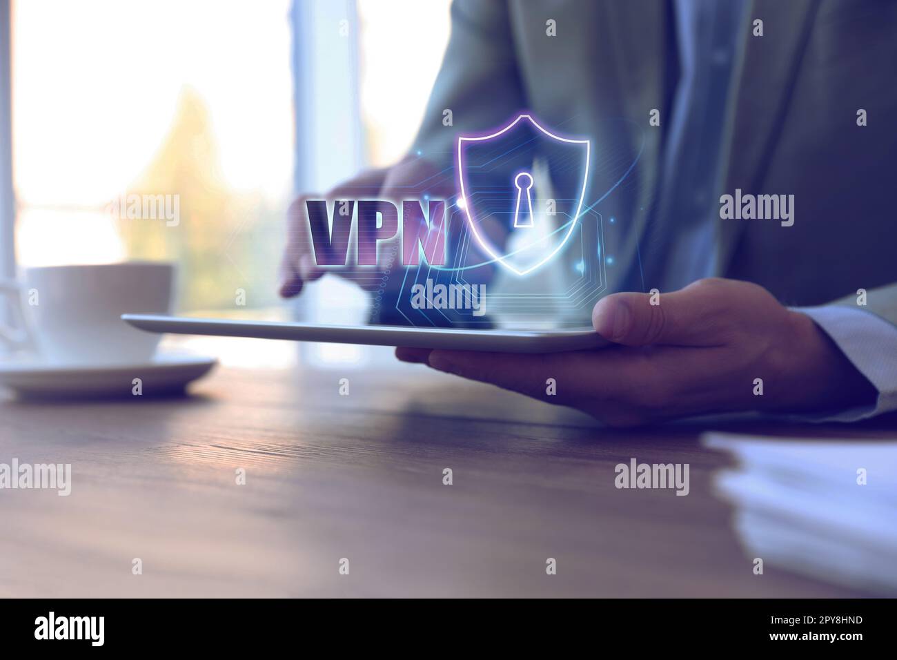 Man using modern tablet with switched on VPN in office, closeup Stock ...