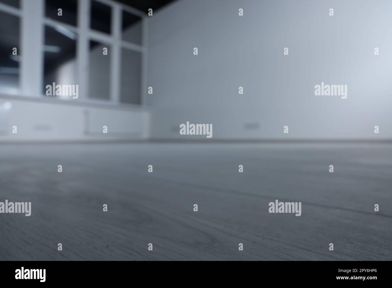 Blurred view of empty room with clean windows and white walls Stock ...