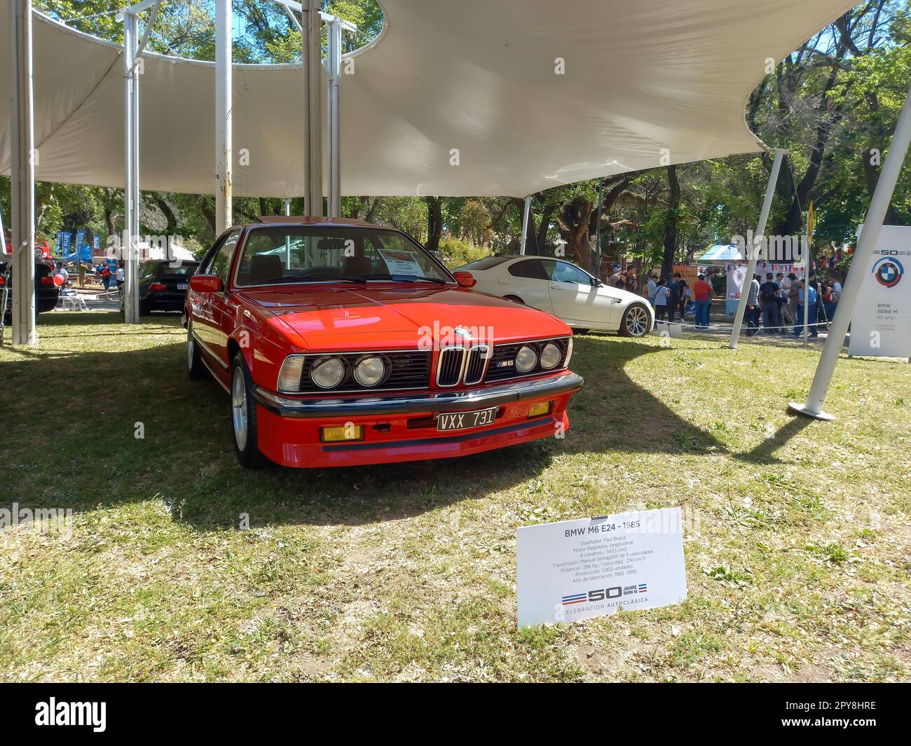Old red sporty luxury executive 1985 BMW M6 E24 in a park. Autoclasica ...