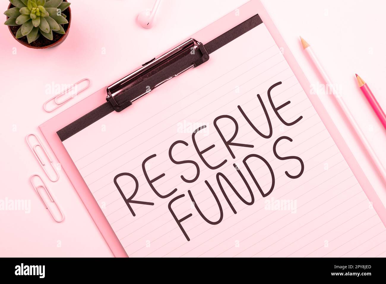 Hand writing sign Reserve Funds. Word Written on money released from ...