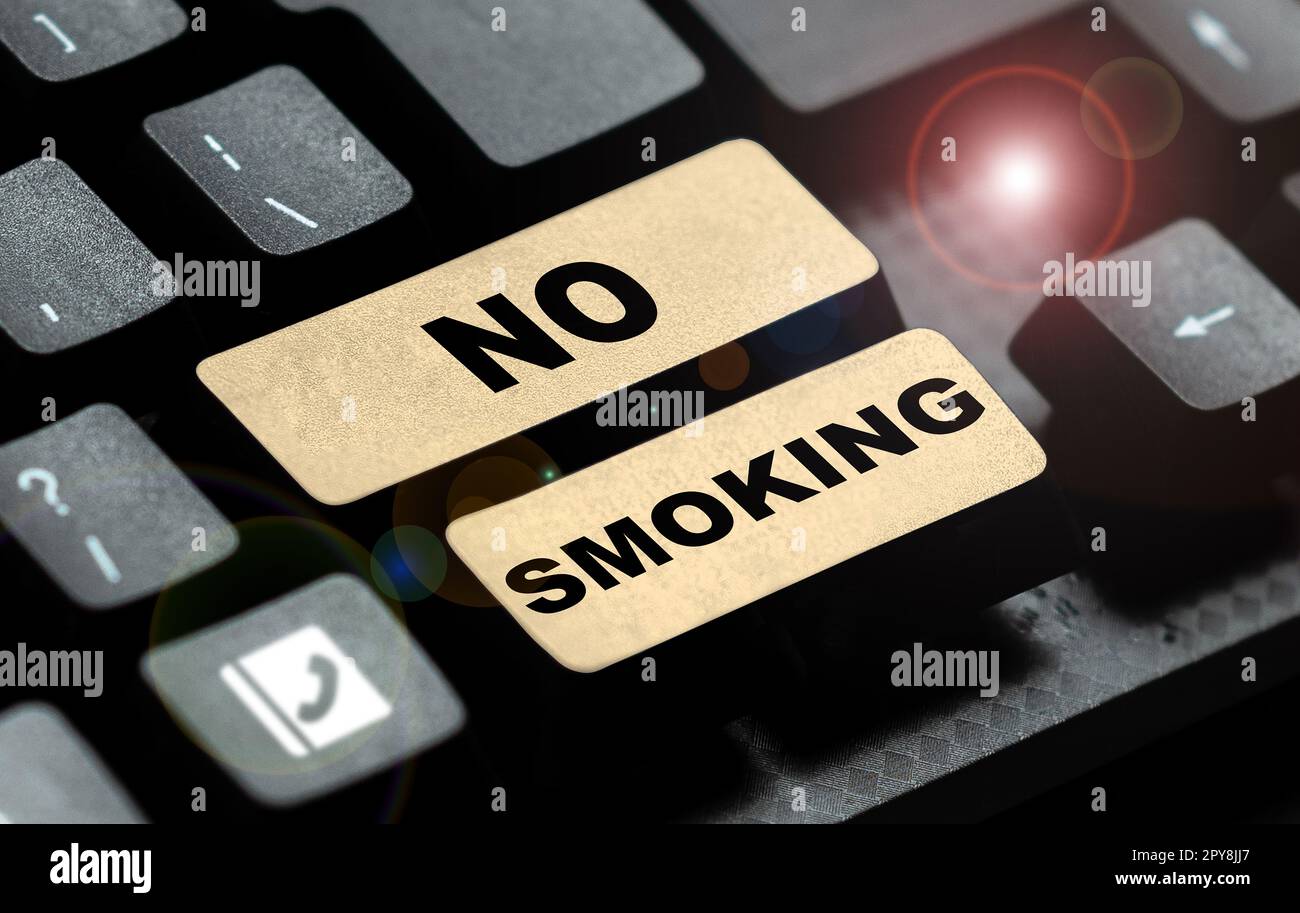 Hand writing sign No Smoking. Word Written on using tobacco is forbiden ...