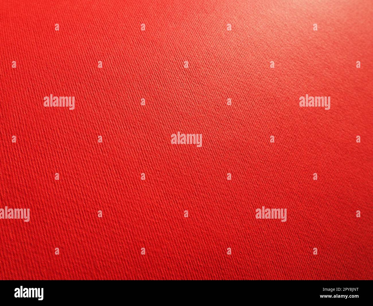 Abstract red background with texture. Close-up of paper surface with ...