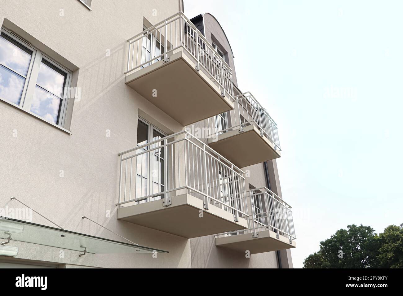 Exterior of beautiful building with empty balconies, low angle view ...