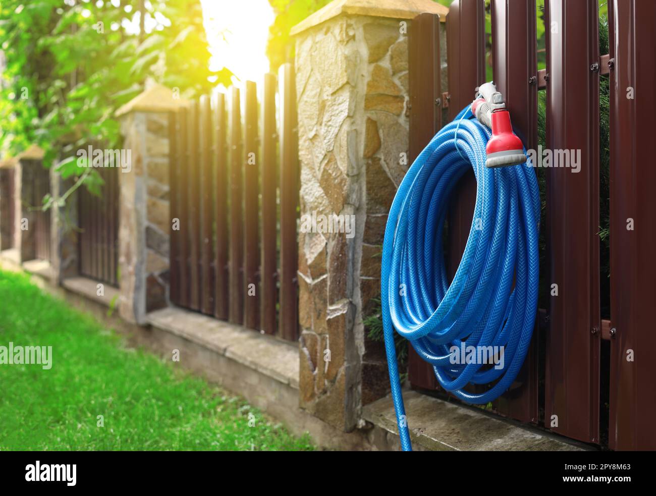 Brown grass hose pipe hi-res stock photography and images - Alamy