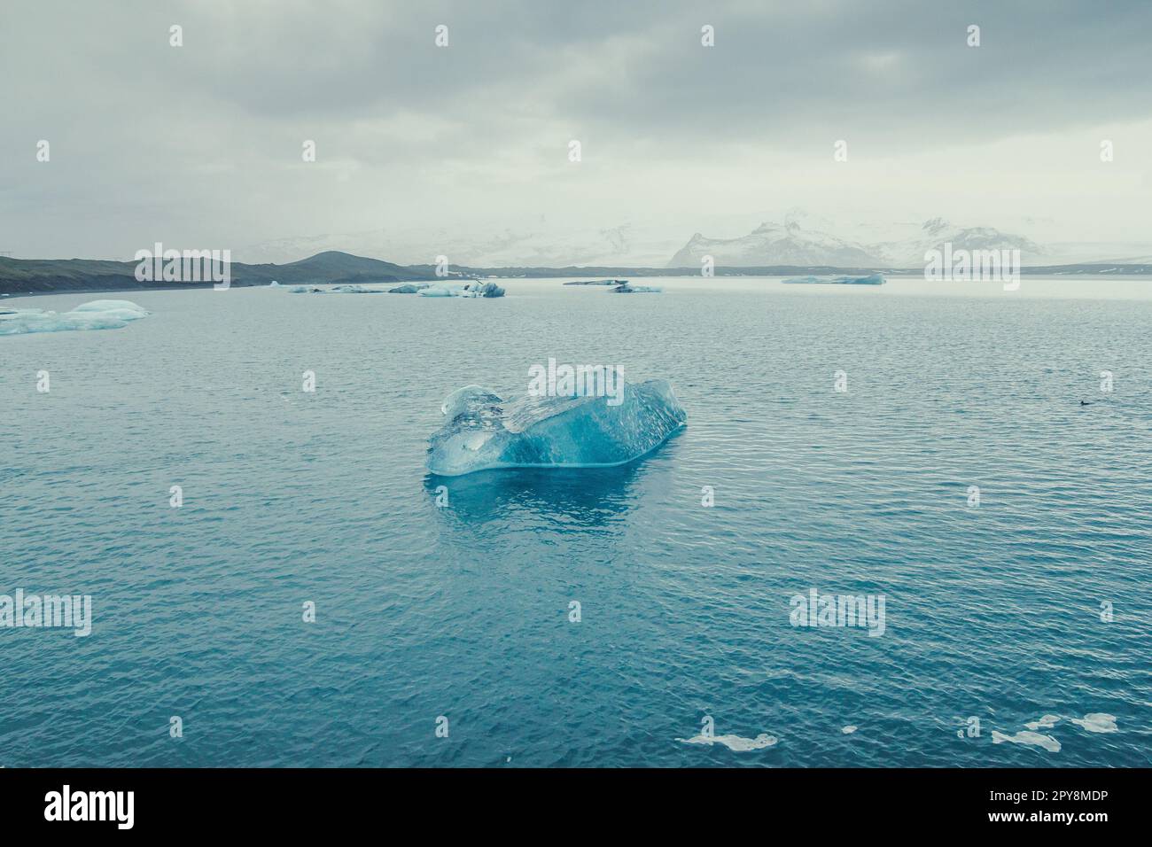 Turquoise iceberg in cold sea landscape photo Stock Photo - Alamy