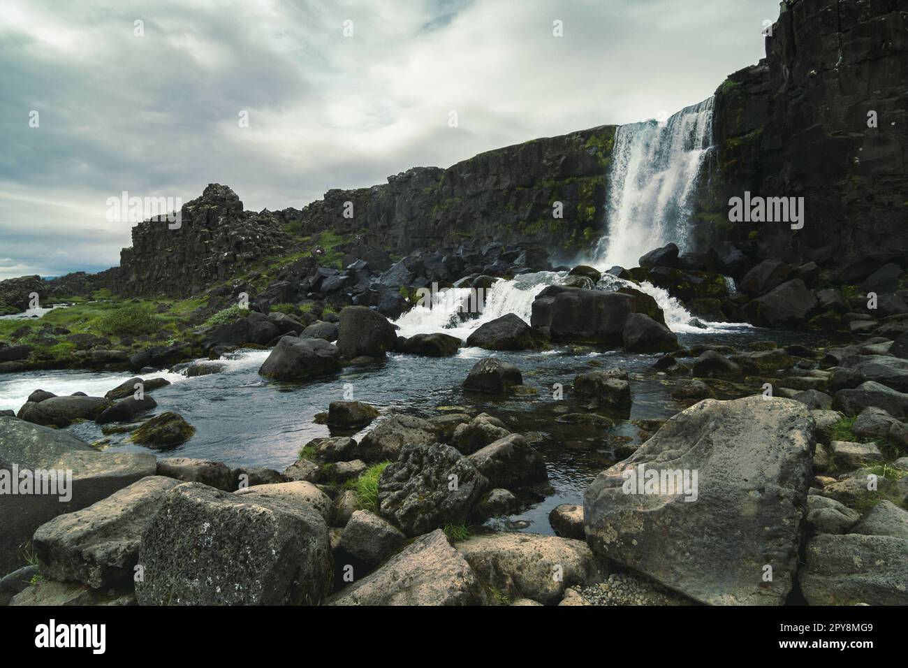 Picturesque waterfall in cliff landscape photo Stock Photo - Alamy