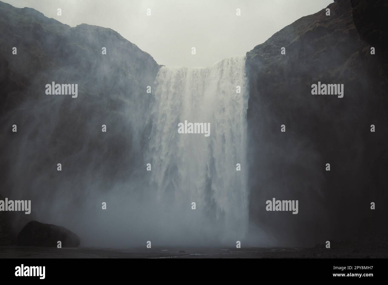 Wonderful waterfall on steep rock landscape photo Stock Photo - Alamy