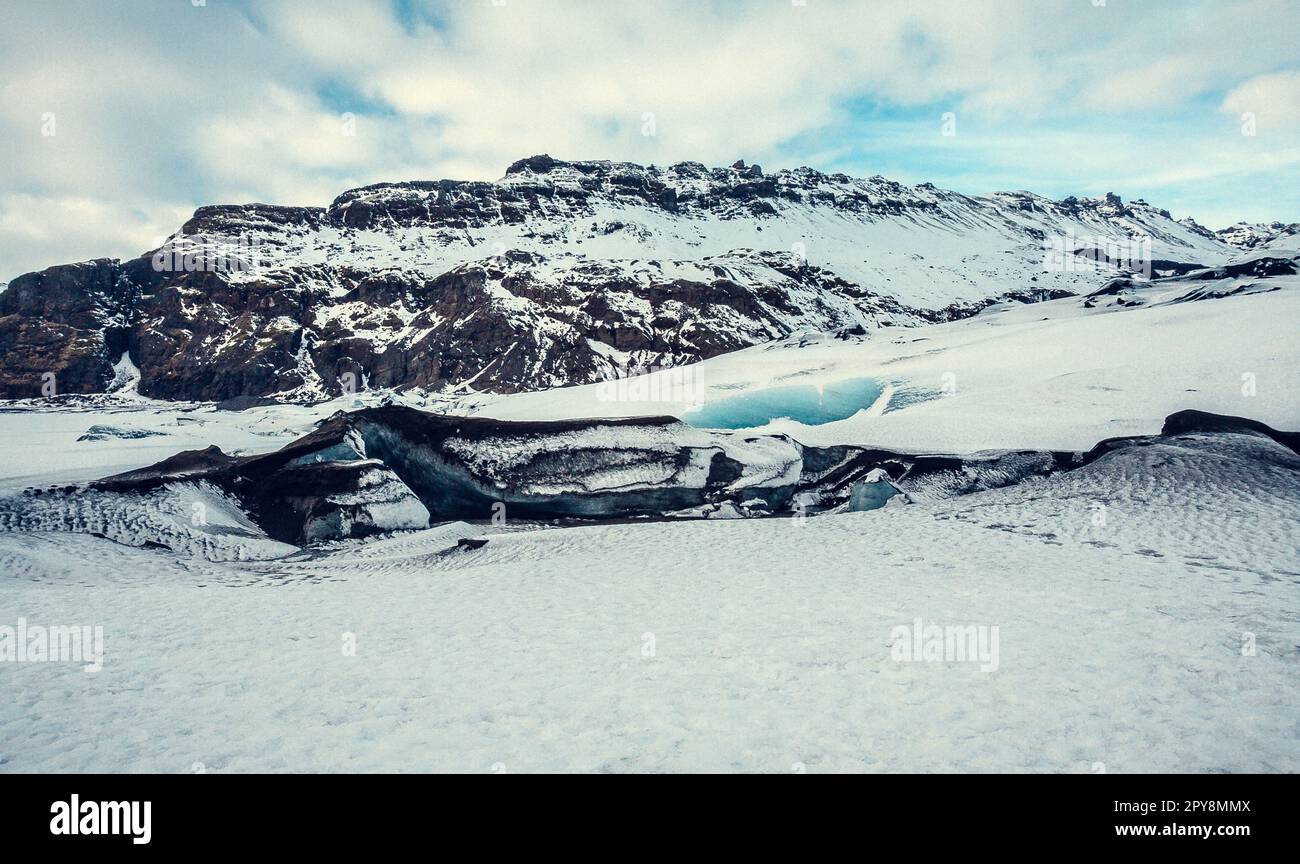 Glacier in rock mountain bottom landscape photo Stock Photo - Alamy