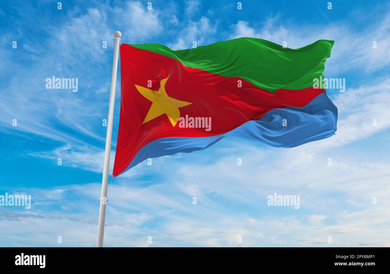 flag of Ethiopian Semitic peoples Tigrinyans at cloudy sky background ...