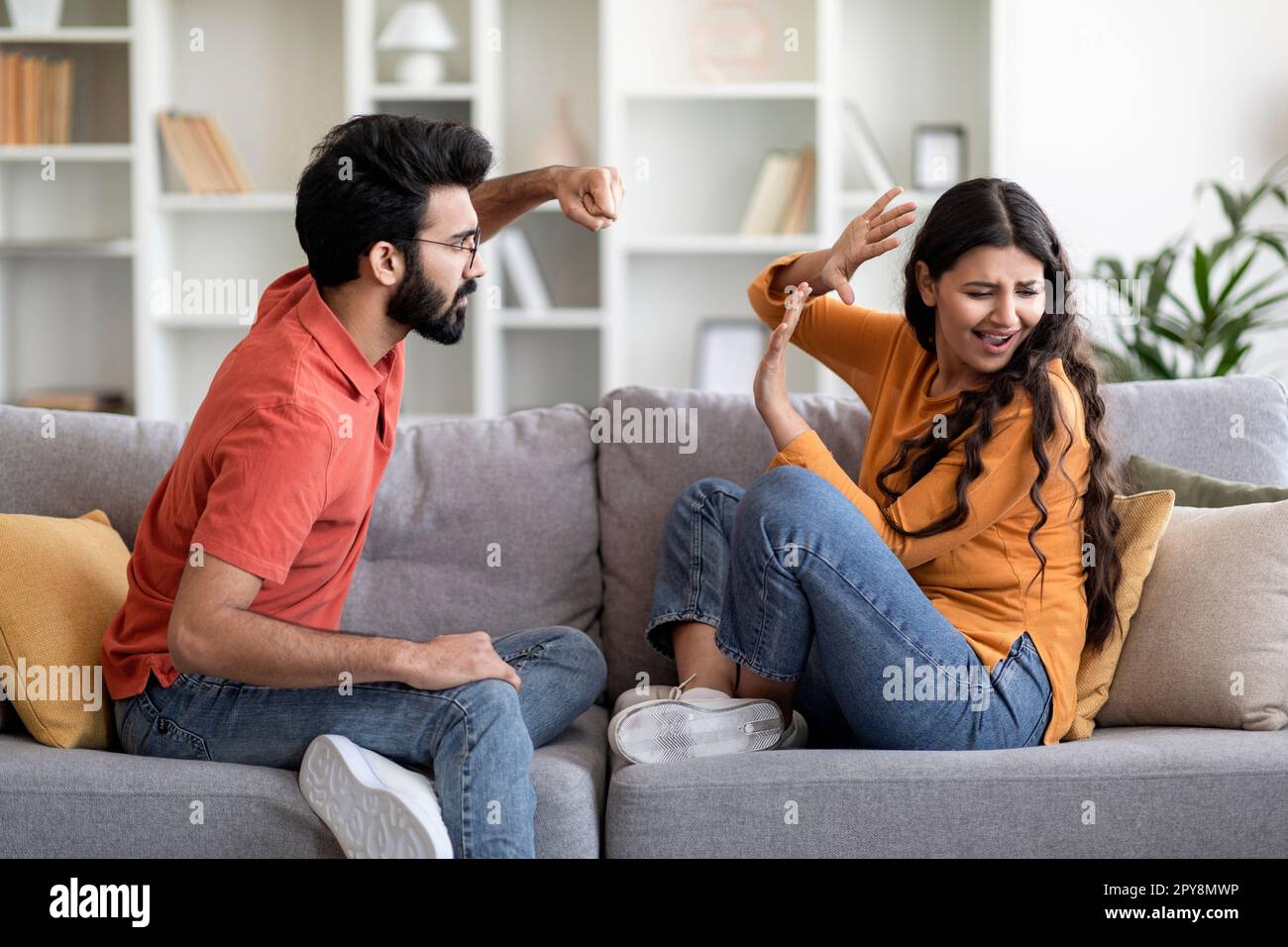 Angry Indian Husband Shouting At Scared Wife At Home Stock Photo - Alamy