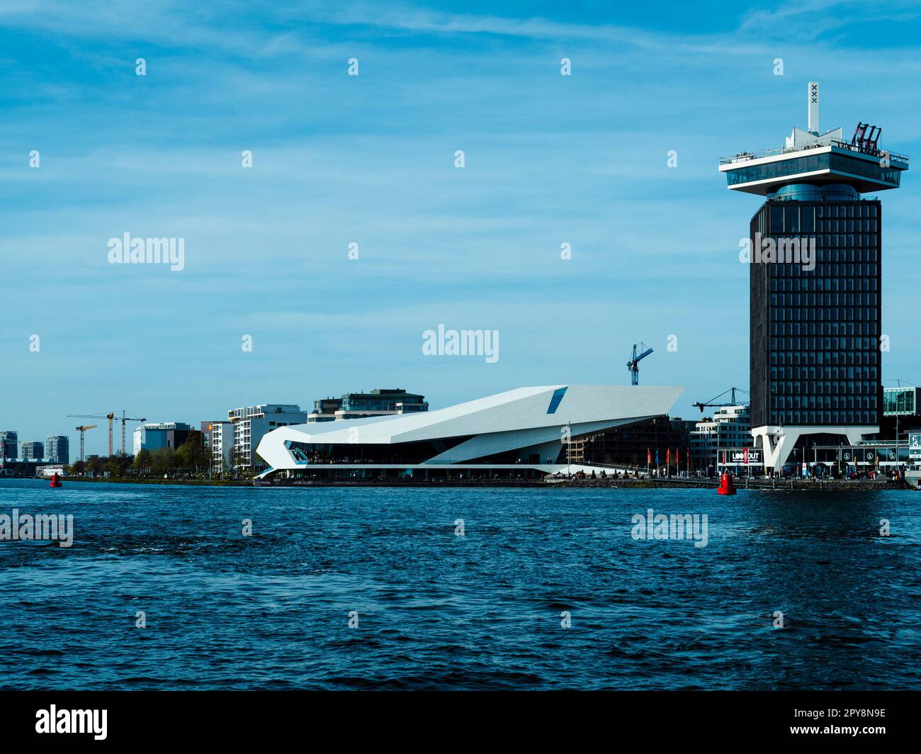 Amsterdam waterfront cityscape by the IJ with the A'DAM Lookout tower ...